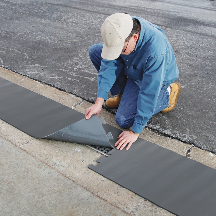 Drive-Over Trench-Drain Cover with Adjustable Length — New Pig